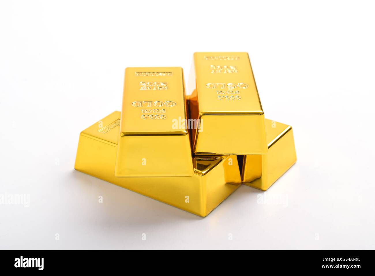 Stack of shiny gold bars isolated on white background Stock Photo - Alamy