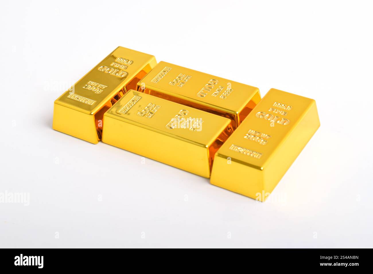 Many shiny gold bars isolated on white background Stock Photo - Alamy