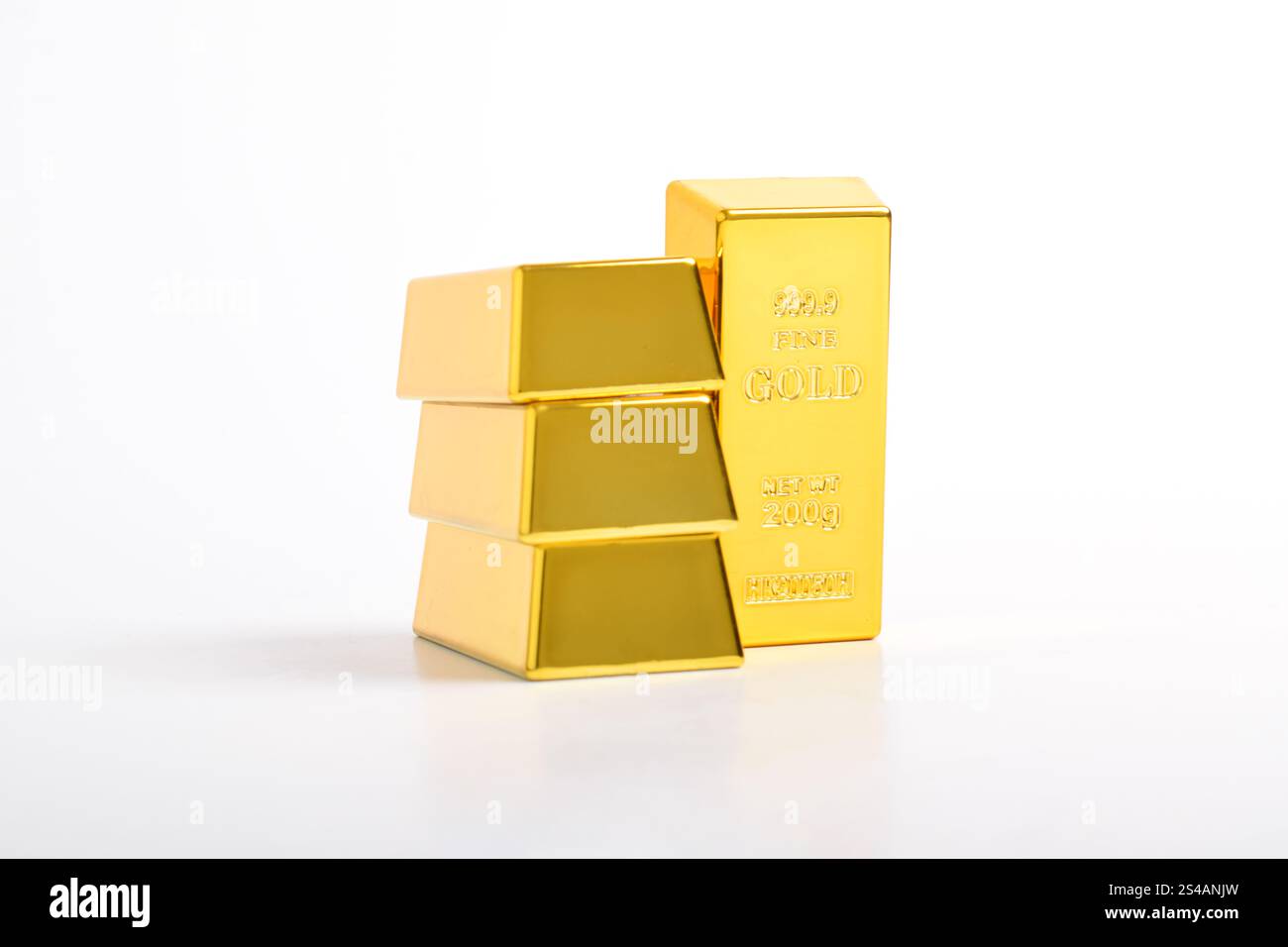Stack of shiny Gold bars bullion isolated white background Stock Photo - Alamy