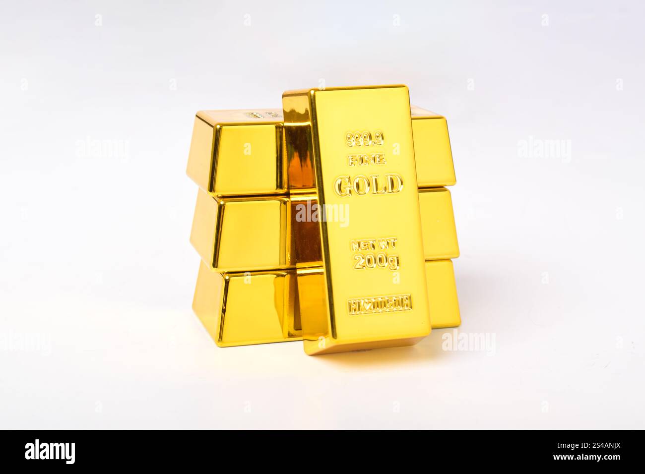 Stack of shiny Gold bars bullion isolated white background Stock Photo - Alamy