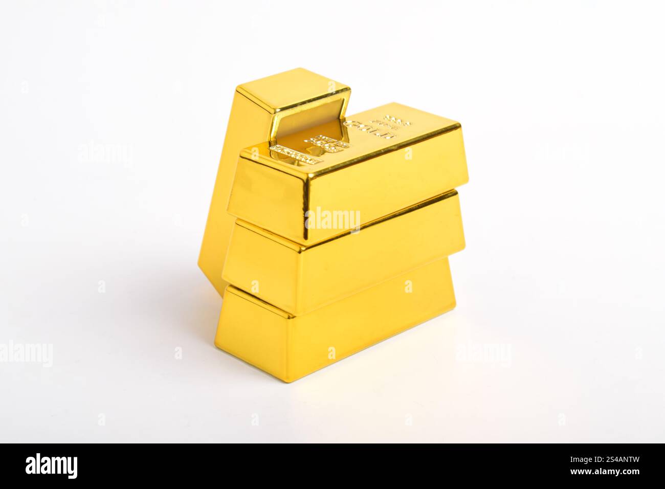 Stack of shiny Gold bars bullion isolated white background Stock Photo - Alamy