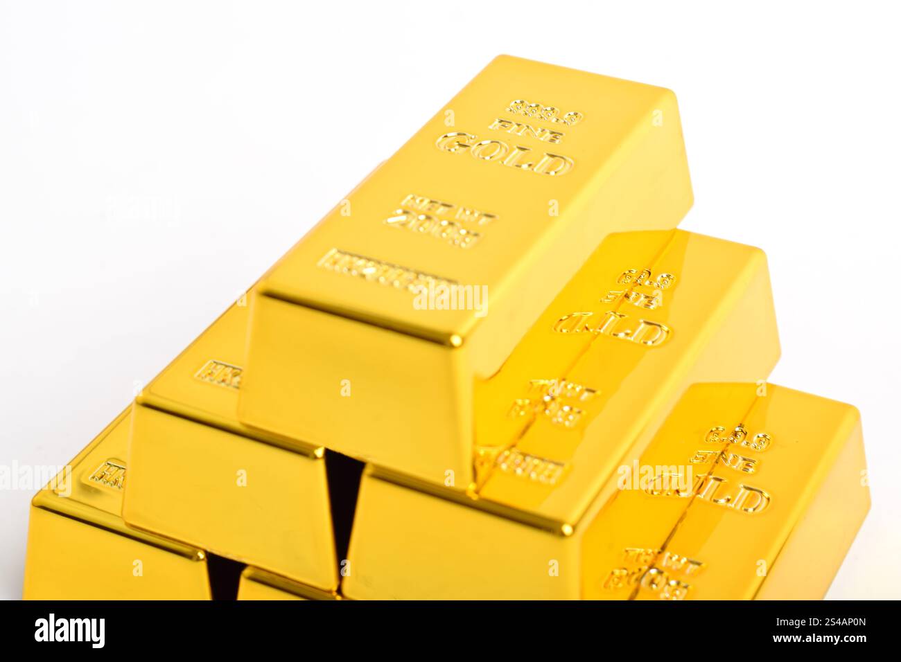 Stack of shiny gold bars isolated on white background, close up Stock Photo - Alamy