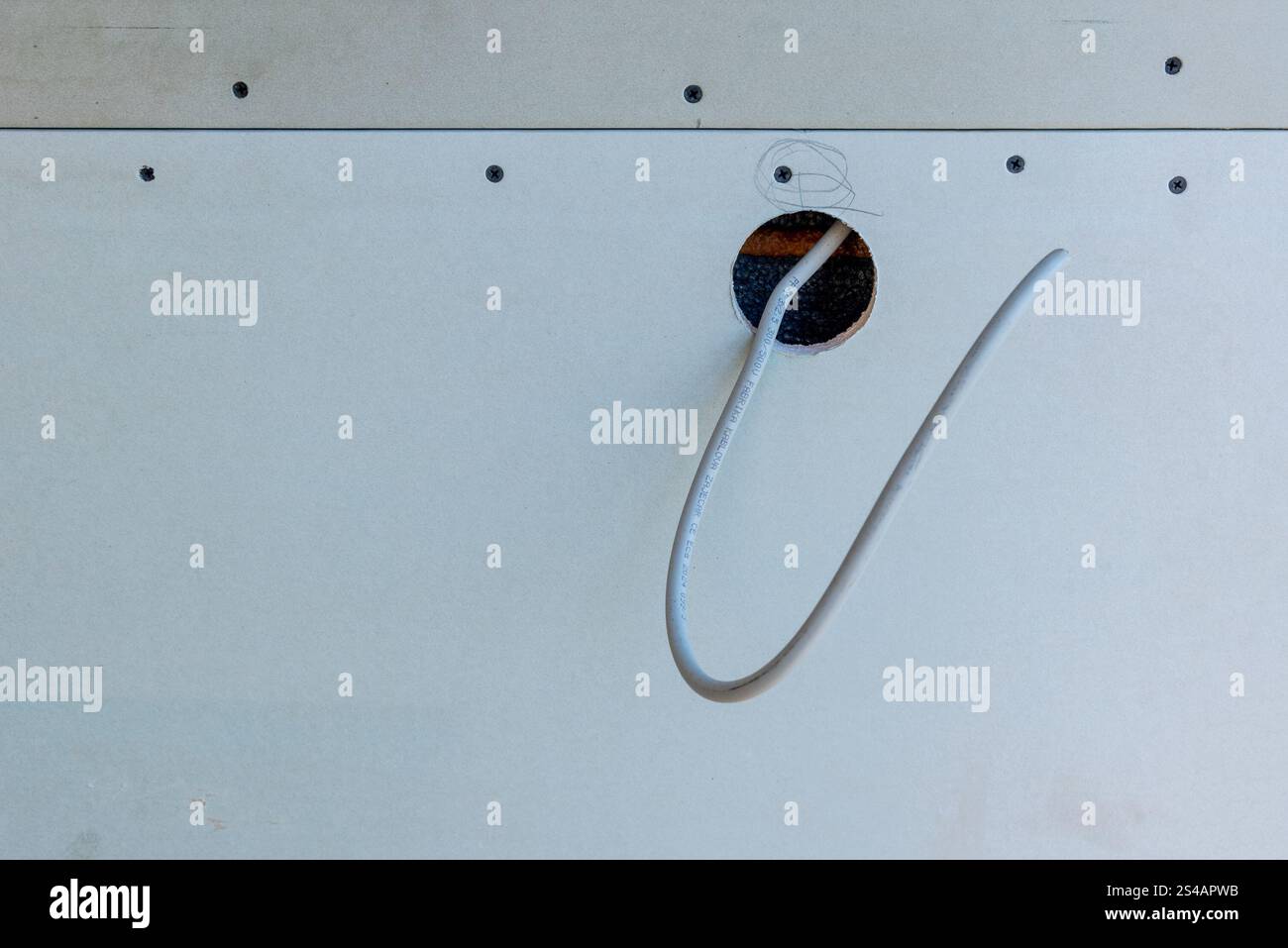 Apartment renovation, the wire sticks out of the hole for sockets in ...