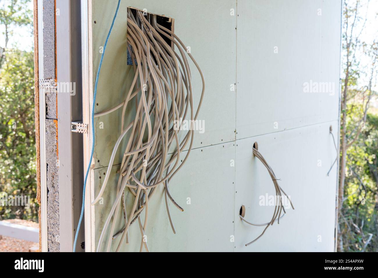 Apartment renovation, the wire sticks out of the hole for sockets in ...