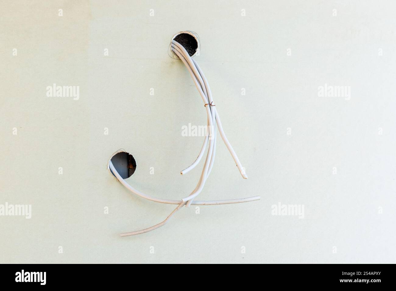 Apartment renovation, the wire sticks out of the hole for sockets in ...