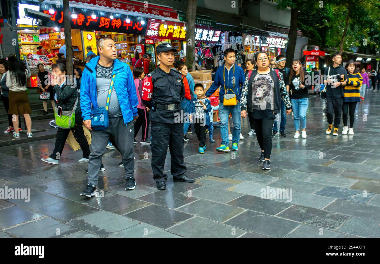 Chengdu, China, Sichuan, Large Crowd People, with Policeman, Looking ...