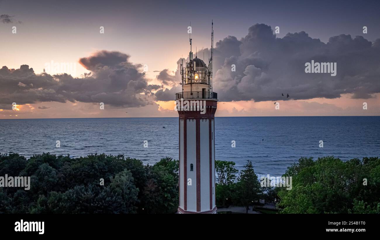 Light beam from lighthouse in Poland by Baltic Sea with big waves Stock ...