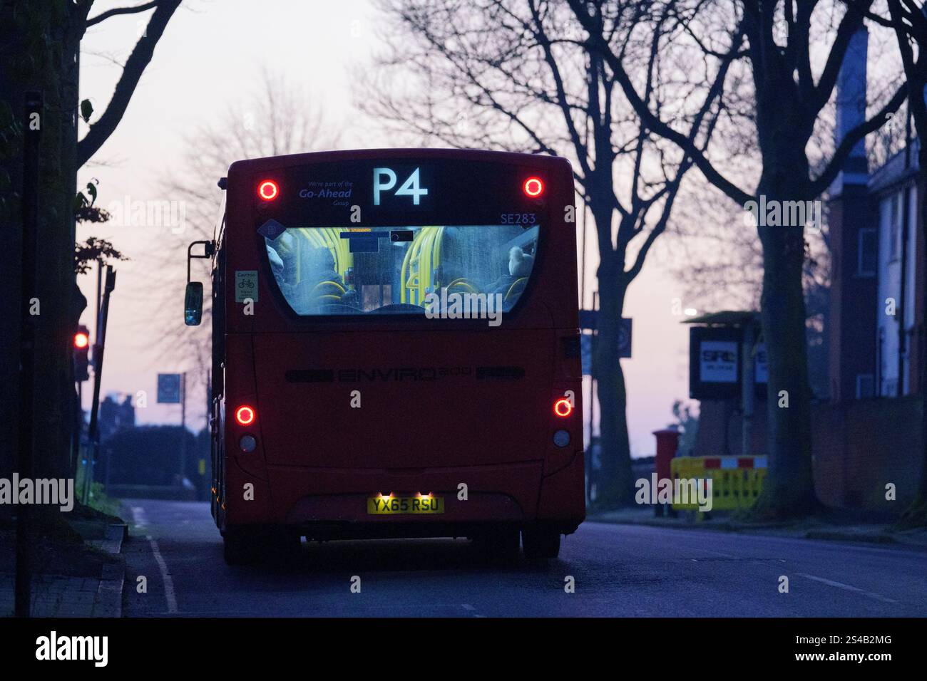On the coldest night of the year so far, a P4 London bus drives towards ...