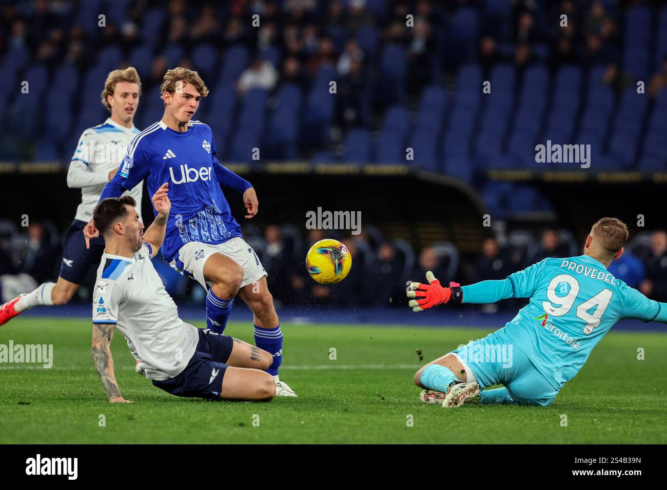 Rome, Italy. 10th Jan, 2025. Nico Paz of Como, Alessio Romagnoli of Lazio seen in action during ...