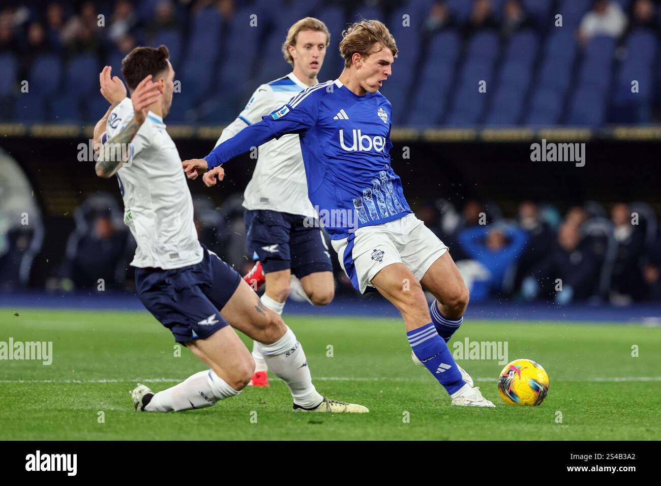 Rome, Italy. 10th Jan, 2025. Nico Paz of Como and Nicolo Rovella of Lazio seen in action during ...