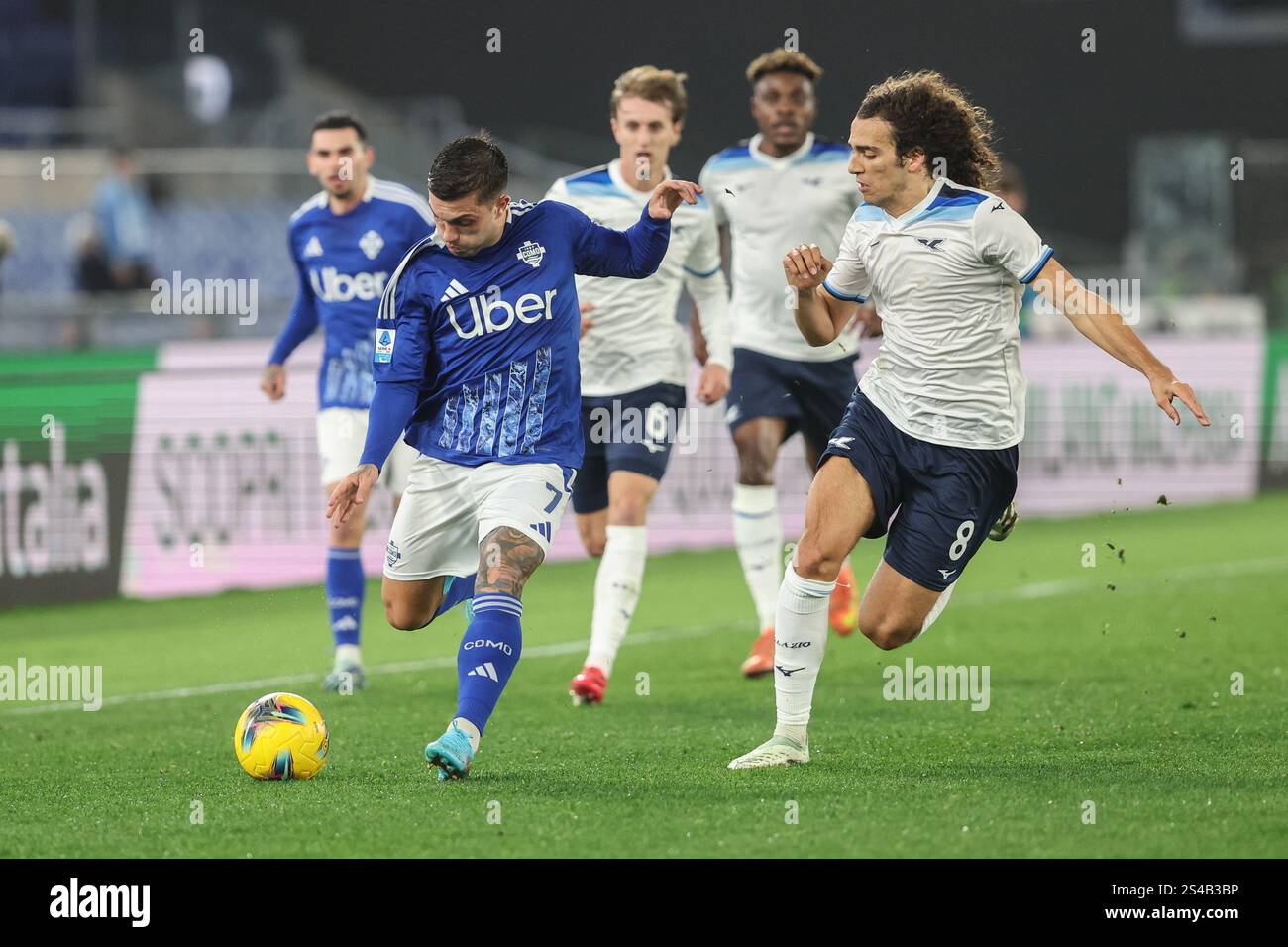 Rome, Italy. 10th Jan, 2025. Gabriel Strefezza of Como and Matteo Guendouzi of Lazio seen in ...