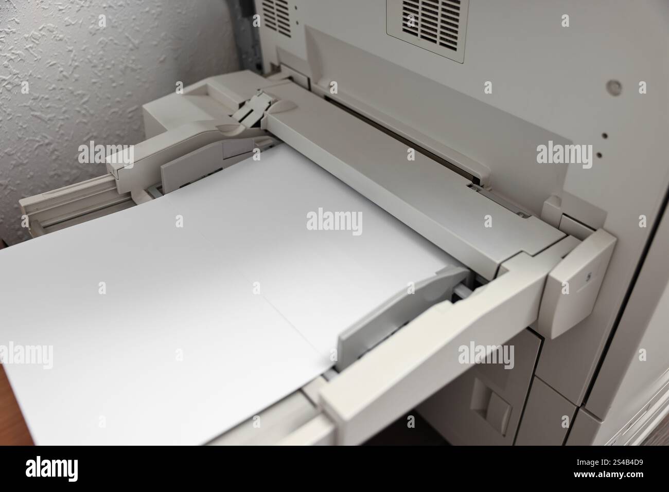 Modern printer with paper indoors, closeup. Printing house Stock Photo ...