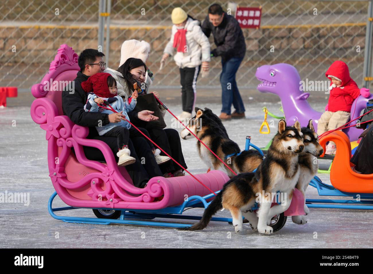 Beijing, China. 11th Jan, 2025. People enjoy themselves on the ice rink ...