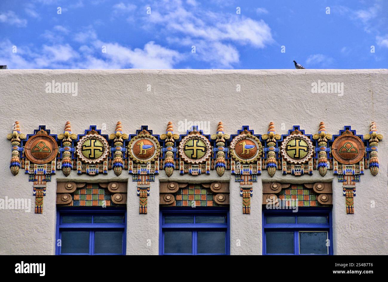 Terra cotta shields at facade of KiMo Theatre, Pueblo Deco style movie ...