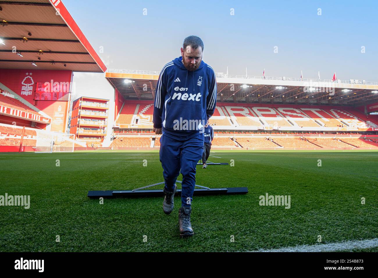 City Ground, Nottingham on Saturday 11th January 2025. Groundsmen ...