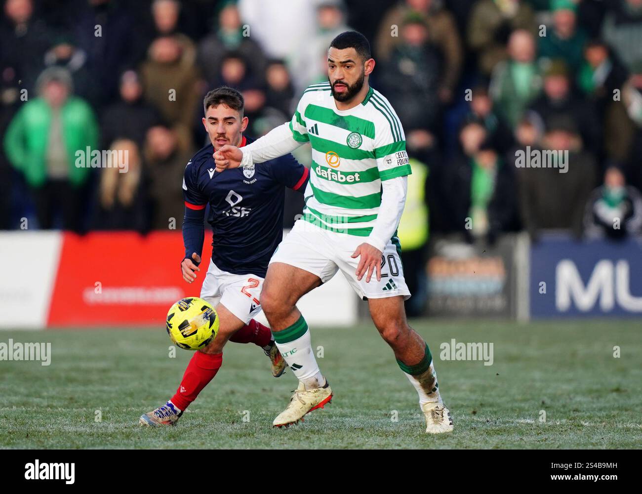 Ross County's Joshua Nisbet (left) and Celtic's Cameron Carter-Vickers ...