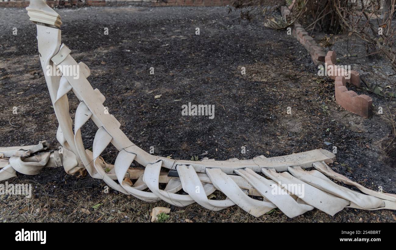 Pacific Palisades, California, USA. 10th Jan, 2025. A gate melted in ...