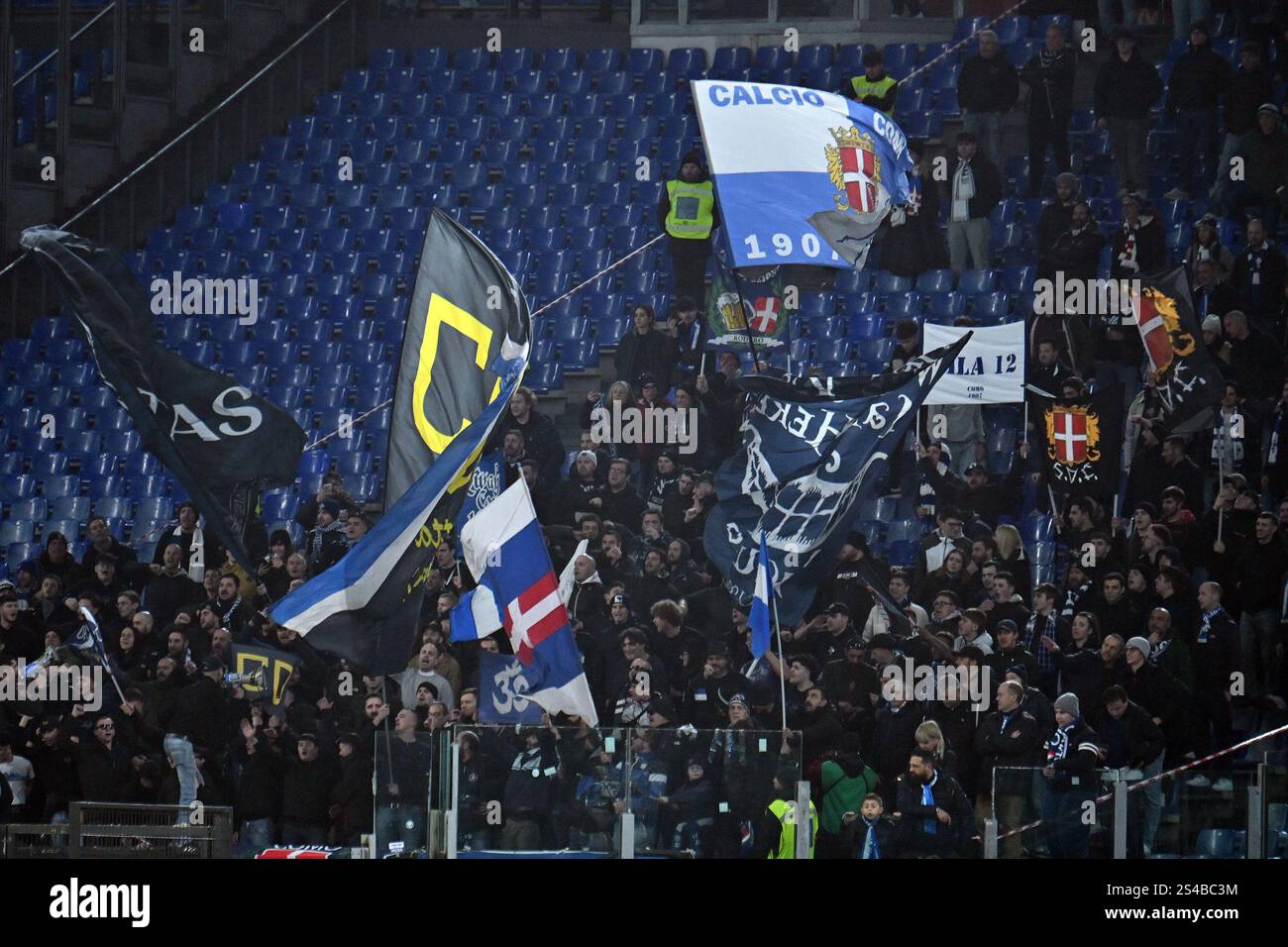 Rome, Italy. 10th Jan, 2025. Como fans cheer during the Serie A match ...