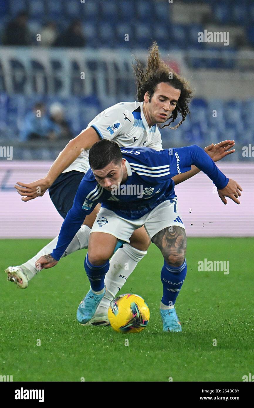 Rome, Italy. 10th Jan, 2025. Matteo Guendouzi of SS Lazio (L) and Gabriel Strefezza of Como (R ...