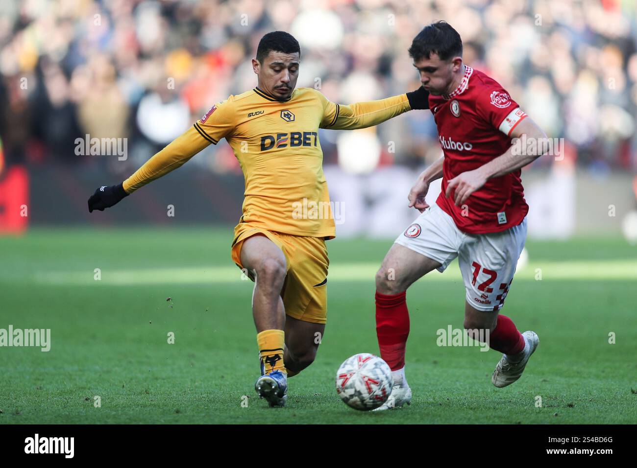 André of Wolverhampton Wanderers pressures Jason Knight of Bristol City ...