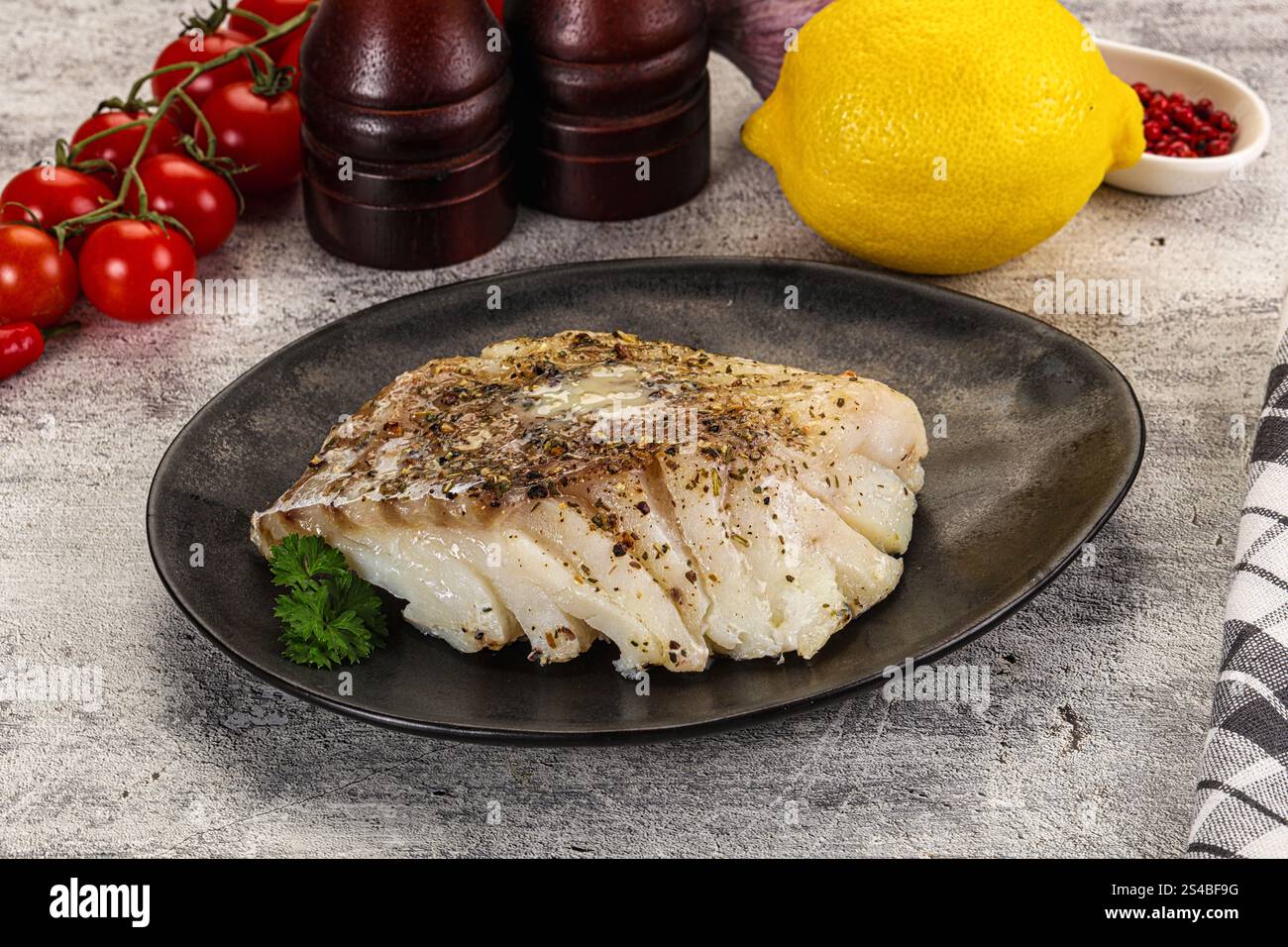 Dietary Baked cod fish fillet with spices Stock Photo - Alamy
