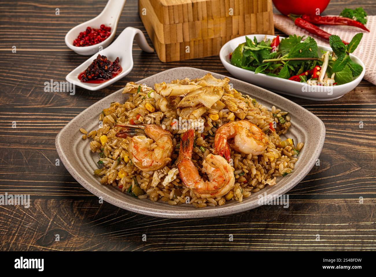Vietnamese traditional fried rice with prawn and squid - Kom Ran Stock ...