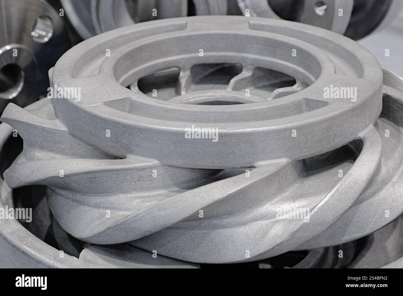 Various cast metal products of complex shapes, group of pipeline ...