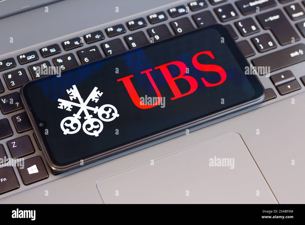 Canada. 11th Jan, 2025. In this photo illustration, the UBS Group AG ...