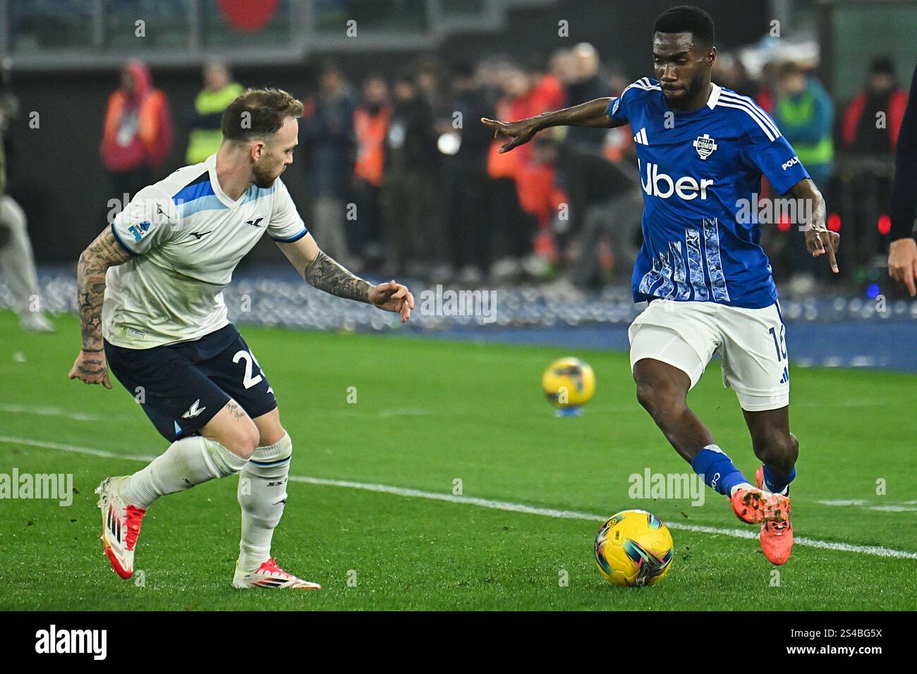 Rome, Italy. 10th Jan, 2025. Manuel Lazzari of SS Lazio (L) and Alieu Fadera of Como (R) seen in ...