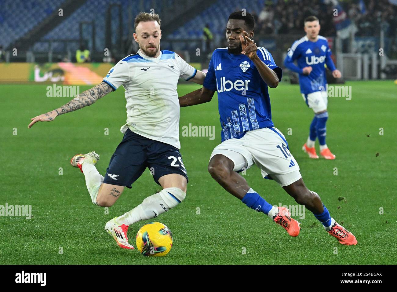 Rome, Italy. 10th Jan, 2025. Manuel Lazzari of SS Lazio (L) and Alieu Fadera of Como (R) seen in ...