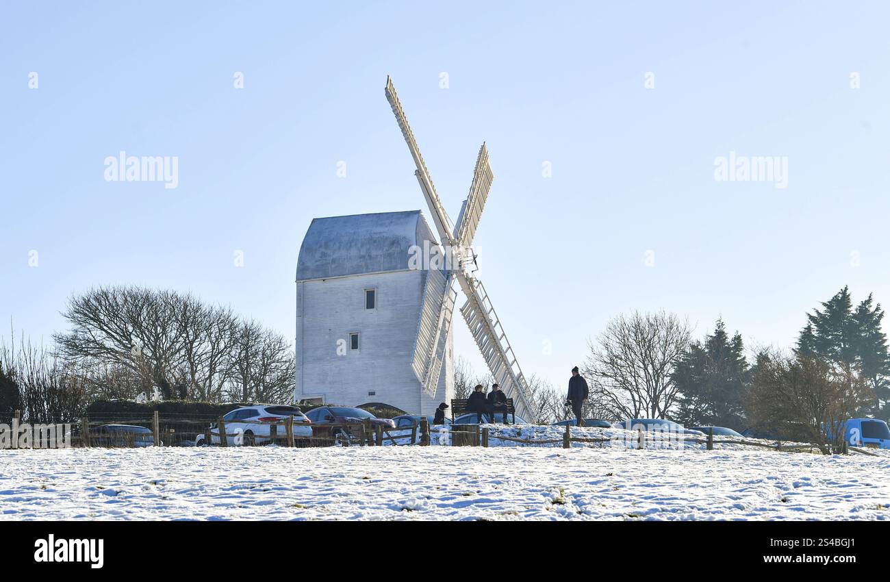 Brighton UK 11th January 2025 - Visitors enjoy the views in the snow by ...