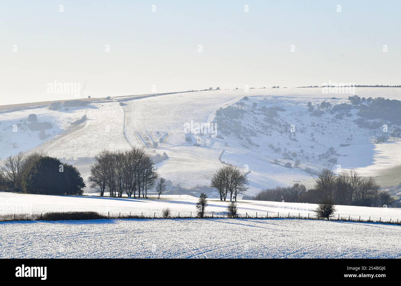 Brighton UK 11th January 2025 - Snow landscape by Jack & Jill windmills ...