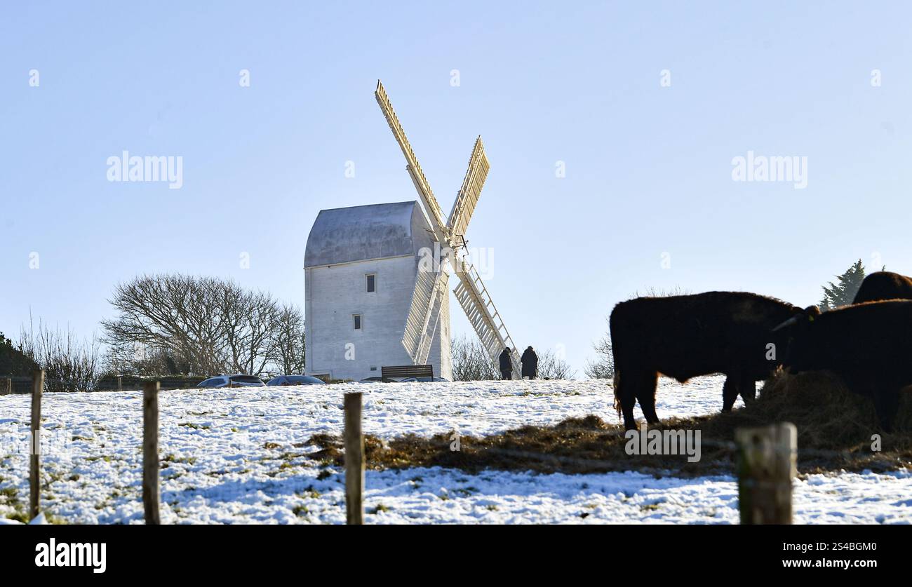Brighton UK 11th January 2025 - Visitors enjoy the views in the snow by ...