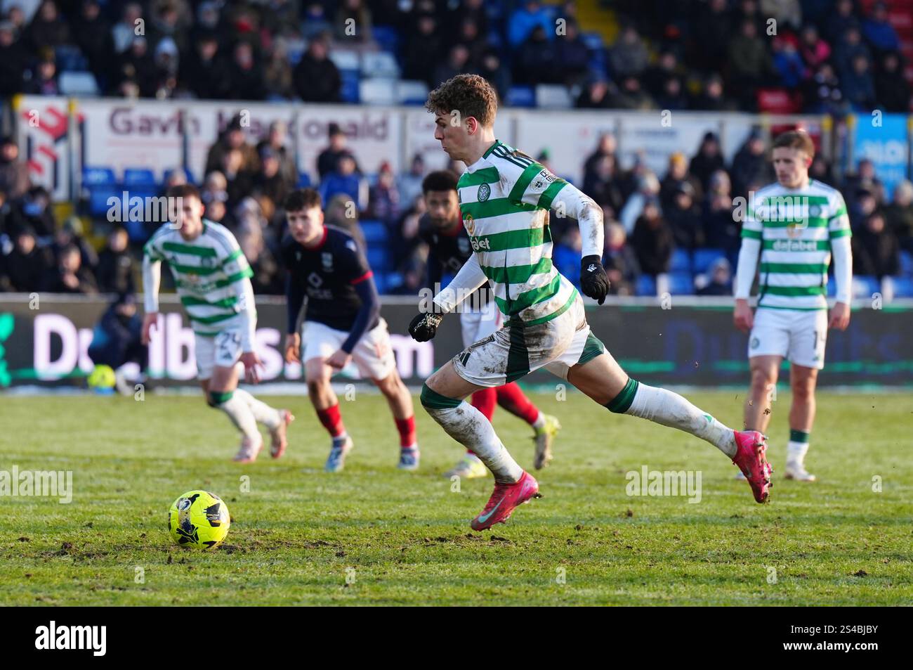 Celtic's Arne Engels scores their side's third goal of the game from ...