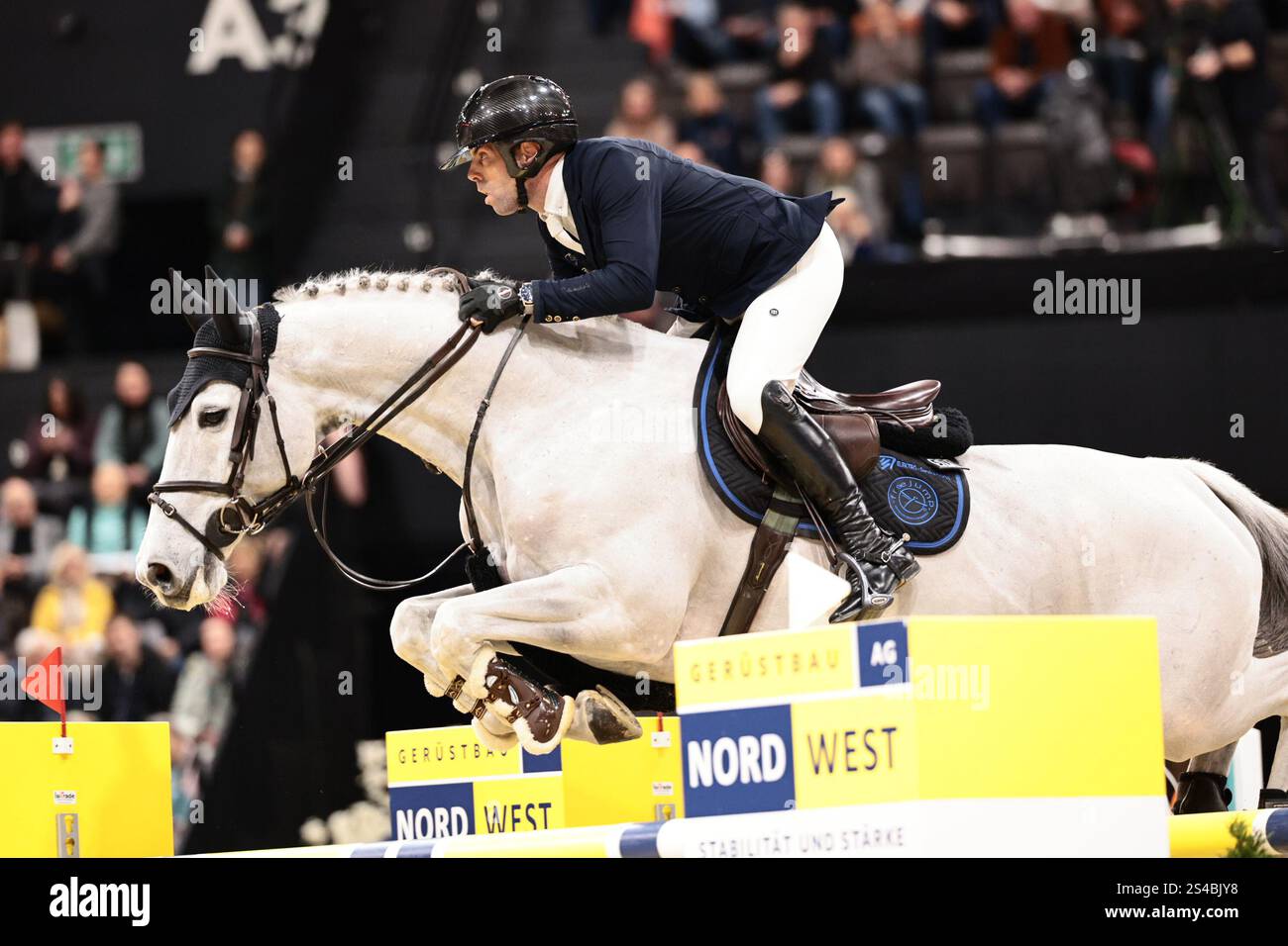Adrian Schmid of Switzerland with Chicharito 11 during the Longines Grand Prix of Basel at the ...