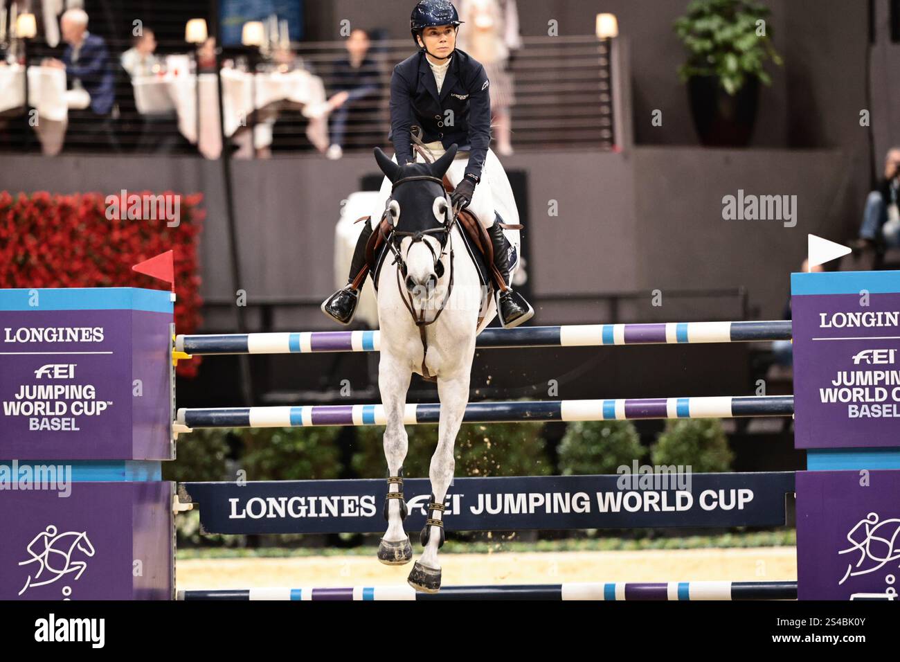 Jane Richard of Switzerland with Molly Mallone Z during the Longines ...