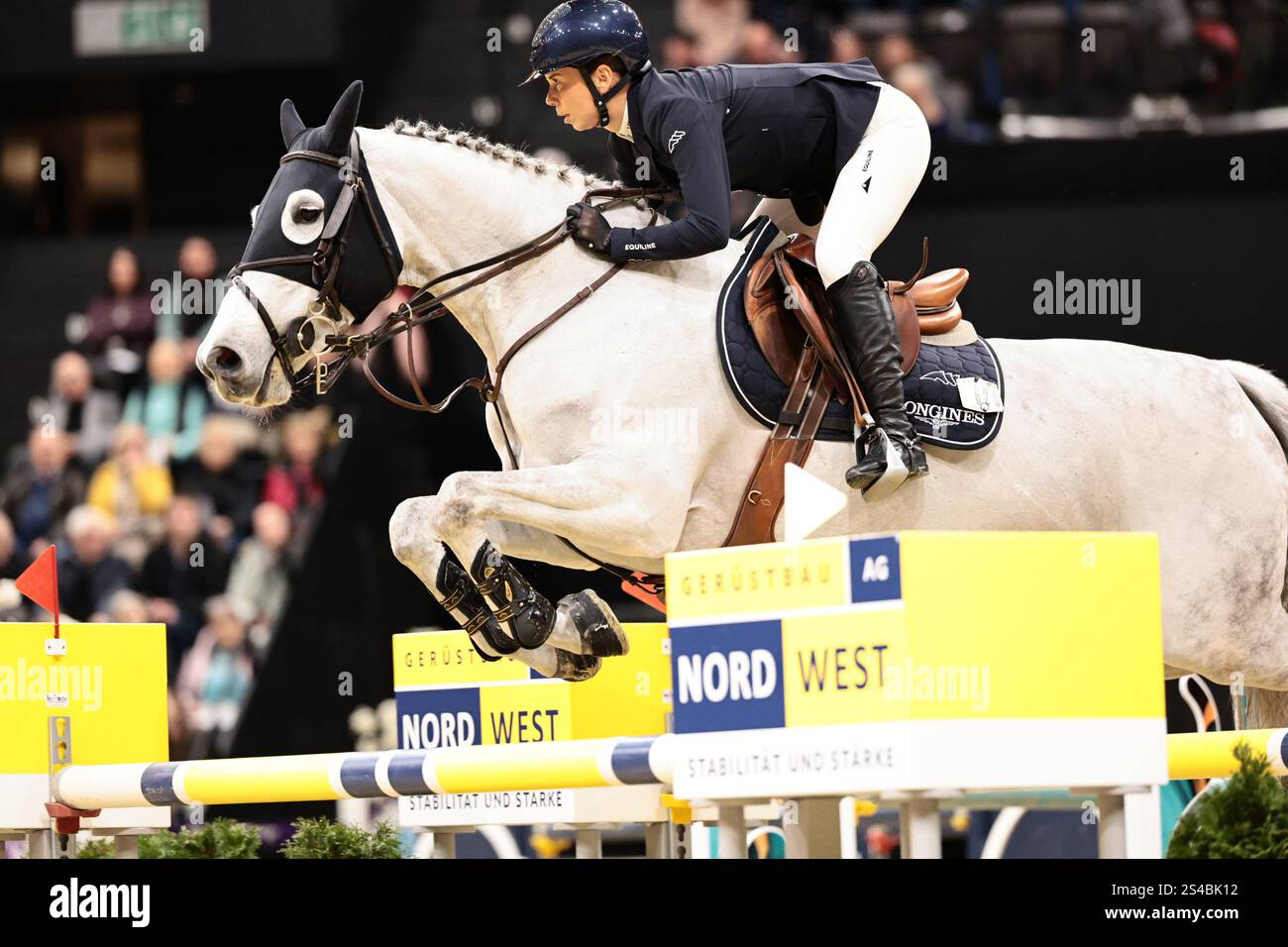 Jane Richard of Switzerland with Molly Mallone Z during the Longines ...