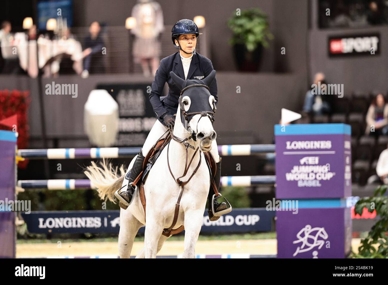 Jane Richard of Switzerland with Molly Mallone Z during the Longines ...
