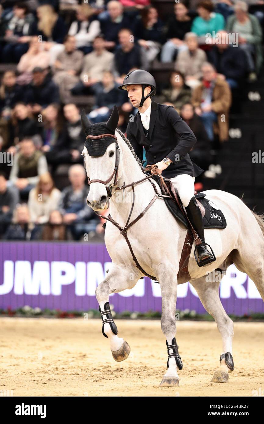 Pieter Devos of Belgium with Primo DV during the Longines Grand Prix of ...