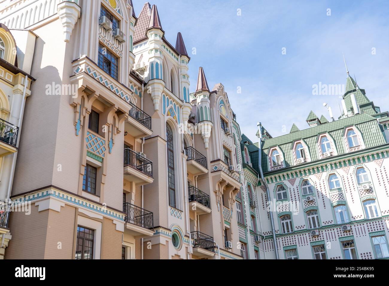 Multicolor modern exterior of houses buildings. Windows balcony facade ...