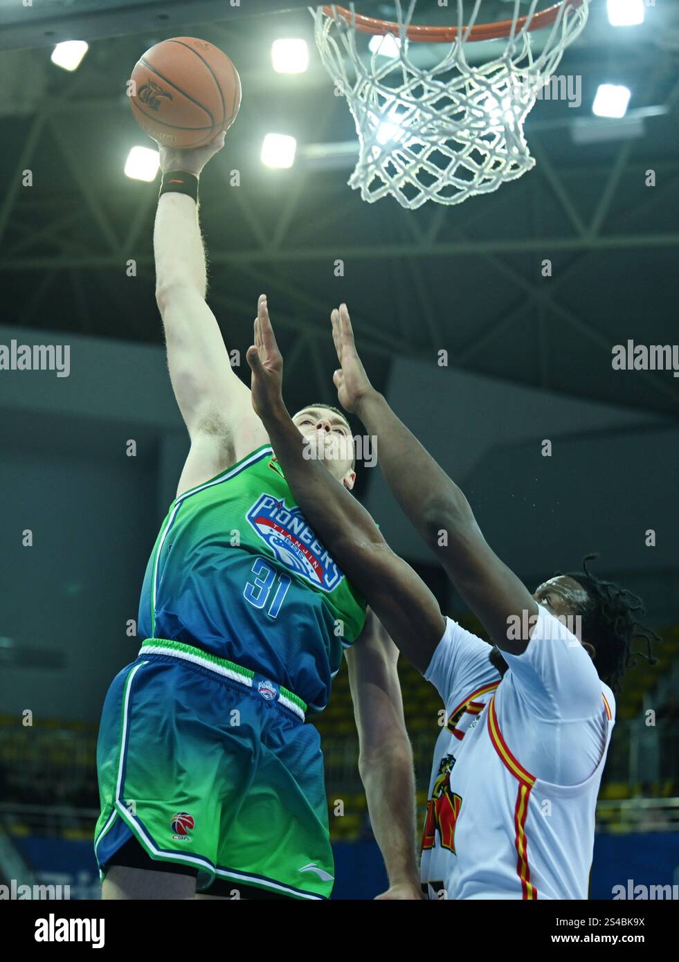 Tianjin, China. 11th Jan, 2025. David Scott James (L) of Tianjin ...