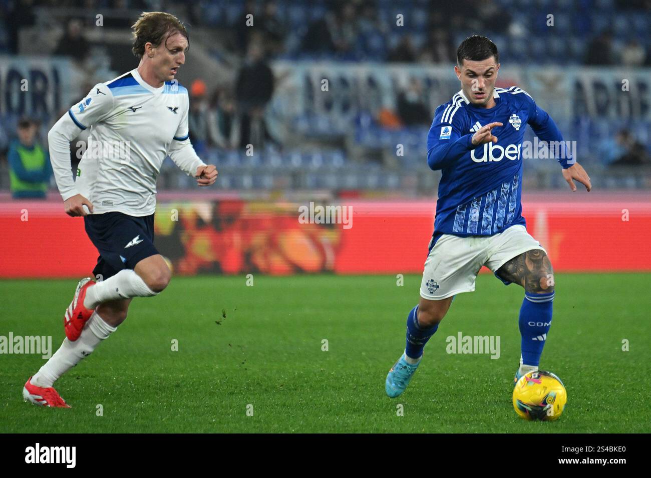 Rome, Lazio. 10th Jan, 2025. Nicolo Rovella of SS Lazio, Gabriel Strefezza of Como during the ...