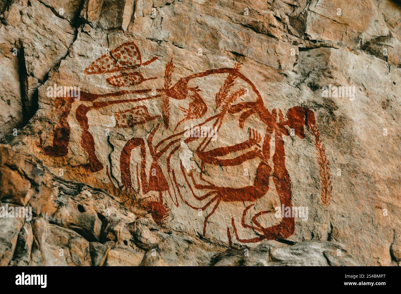 Ancient rock art showcasing intricate symbols and figures, painted with ...