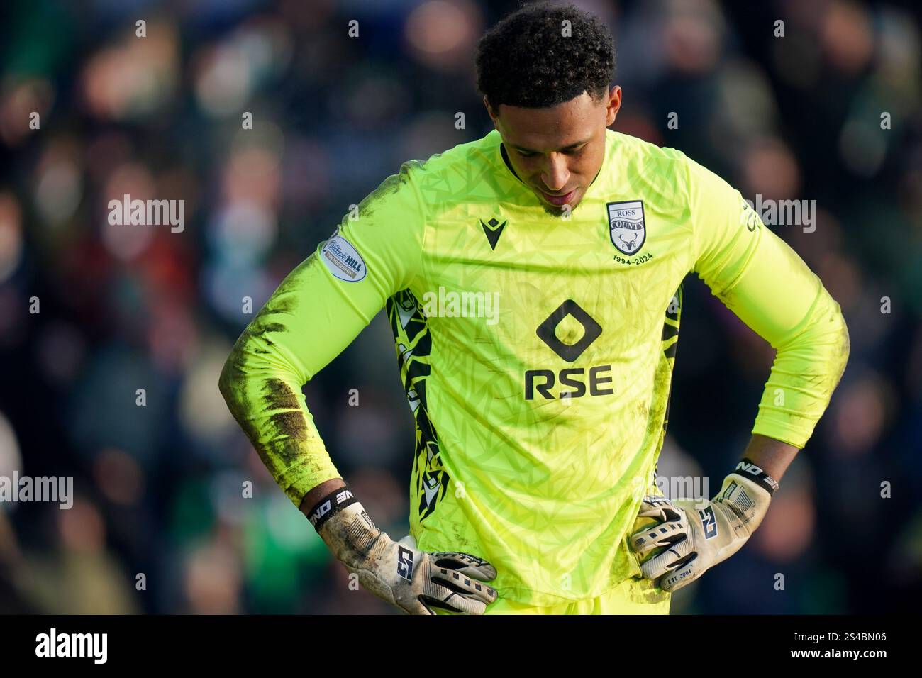 Ross County goalkeeper Jordan Amissah appears dejected during the ...