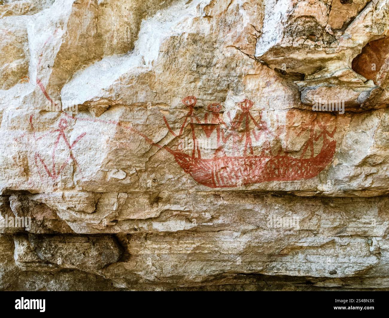 Ancient petroglyph showing intricate artwork with a human figure and a ...