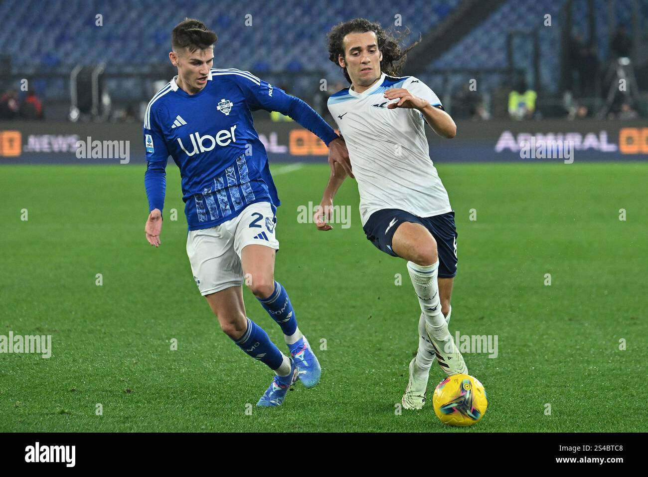 Rome, Lazio. 10th Jan, 2025. Yannik Engelhardt of Como, Matteo Guendouzi of SS Lazio during the ...