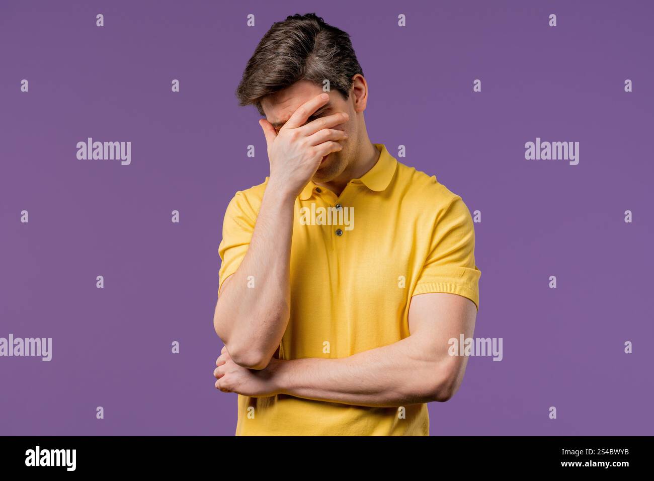 Worried man doing facepalm gesture, covering face with hands, like no ...