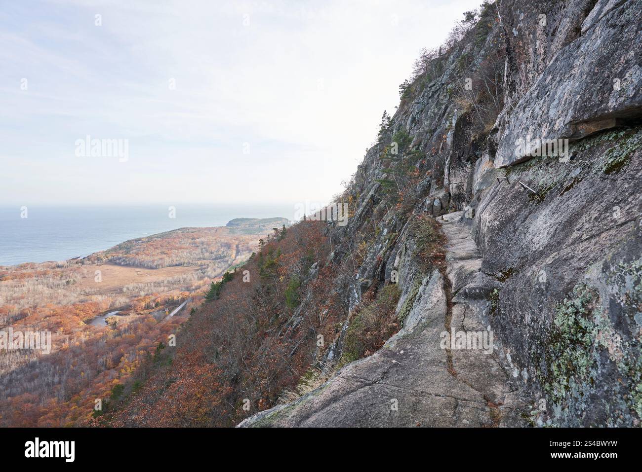 The precipice is a narrow trail that runs along a steep cliff face. The path provides some of ...