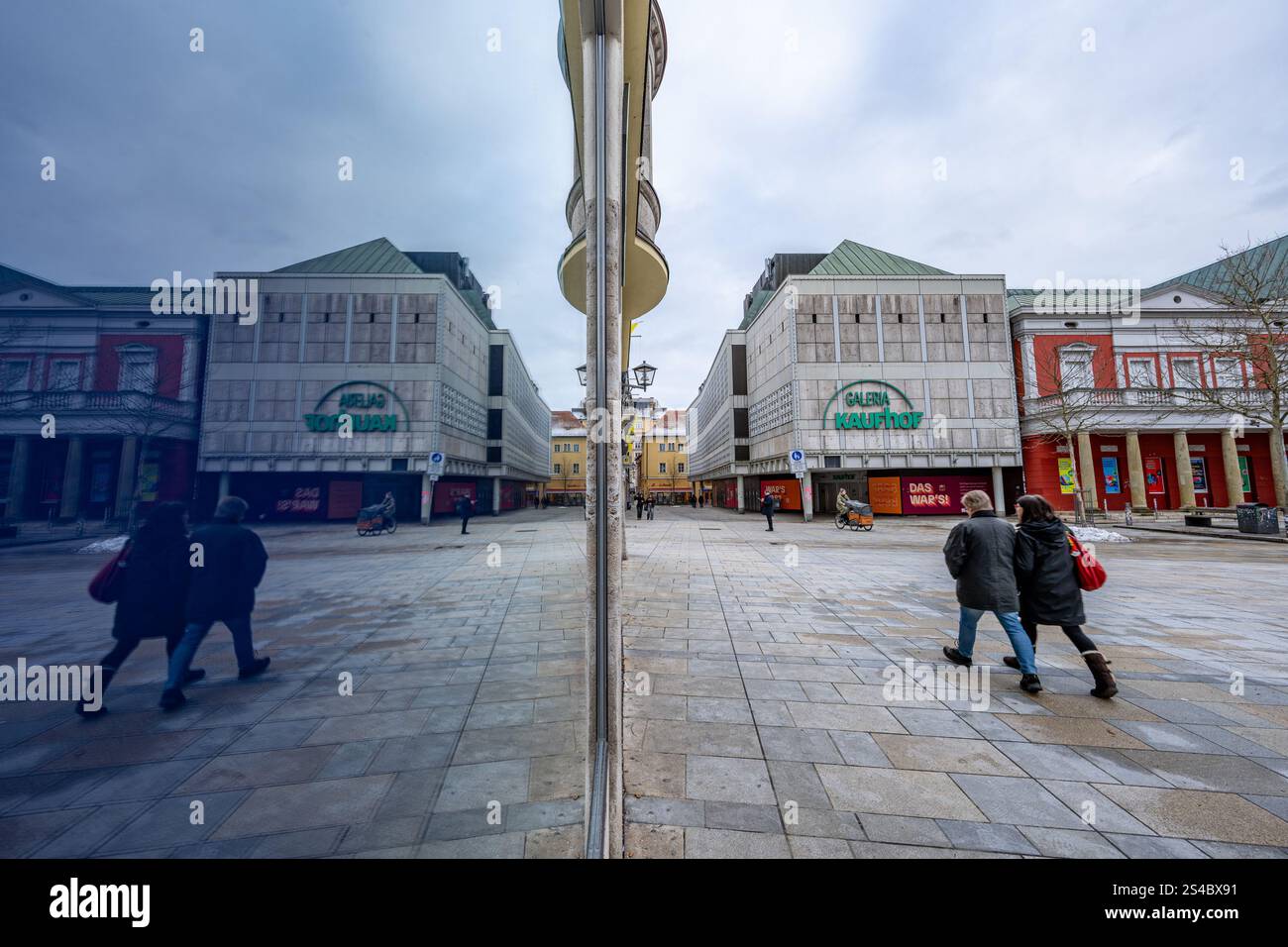 Regensburg, Germany. 10th Jan, 2025. Passers-by walk past the former ...