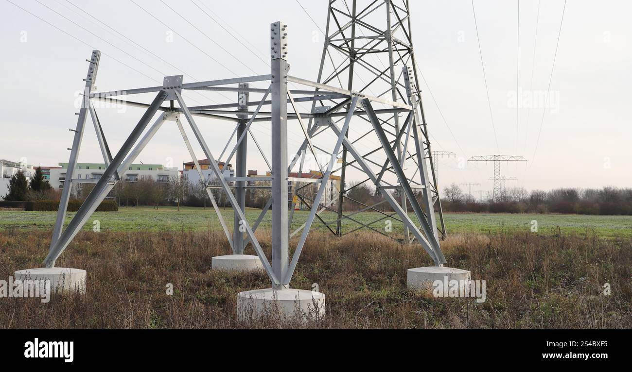 a new high-voltage pylon is being built Stock Photo - Alamy